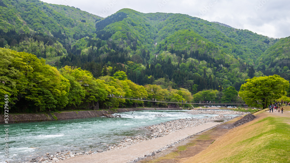 Bridge over the river to Shirakawa-go village in Gifu and Toyama ...