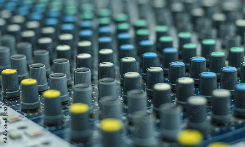 Sound check for the concert. Mixer control. Music engineer. Buttons and ...