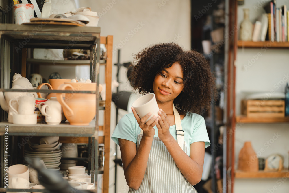 happy smiling girl having fun to learning and work with craft art of ...