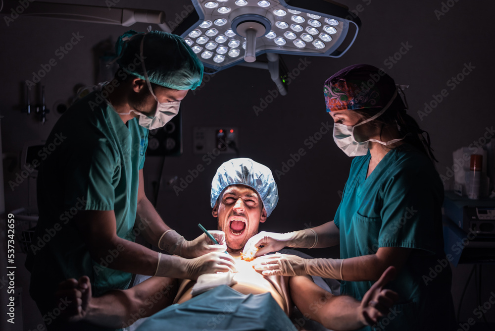 Patient screaming during operation Stock Photo | Adobe Stock