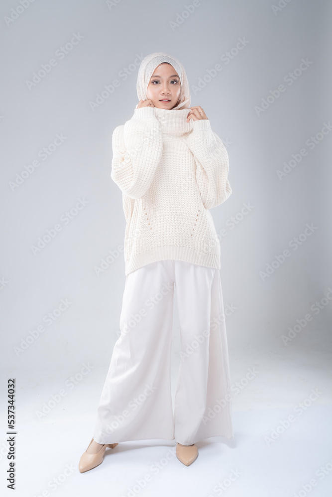 Full length portrait of a beautiful Muslim female model wearing modern ...