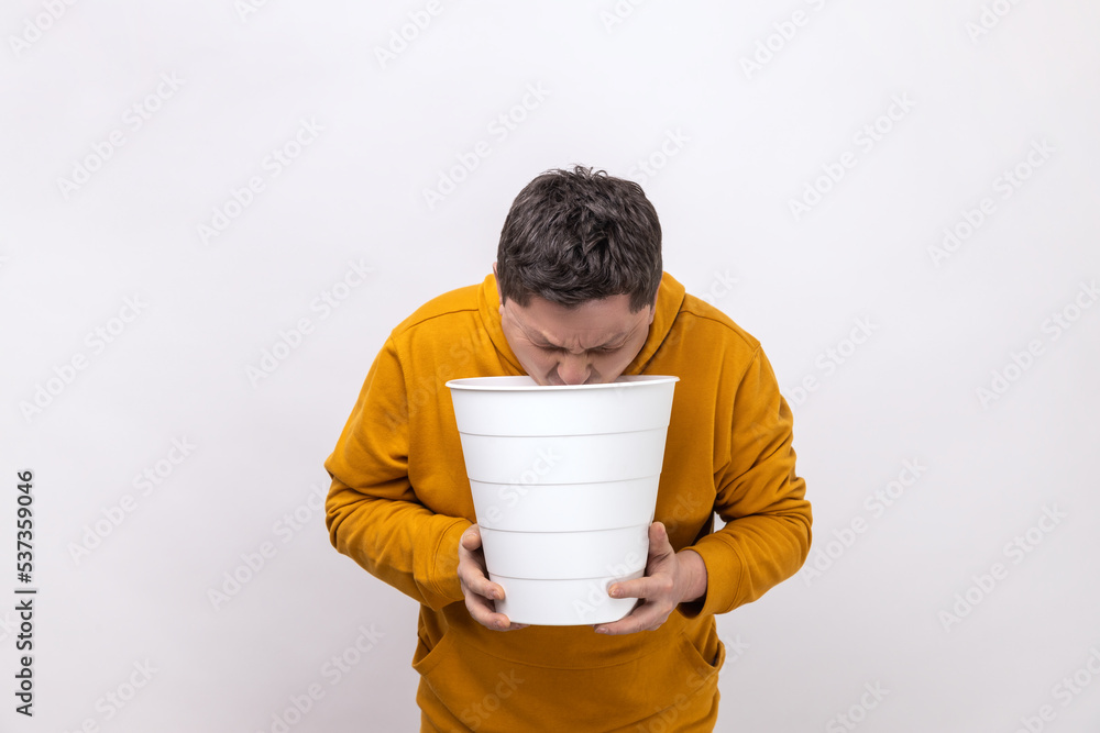 Portrait of middle aged unhealthy man having sudden vomit, suffering ...