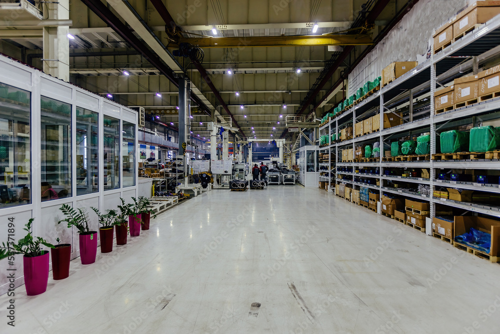Industrial warehouse with machine spare parts and construction ...
