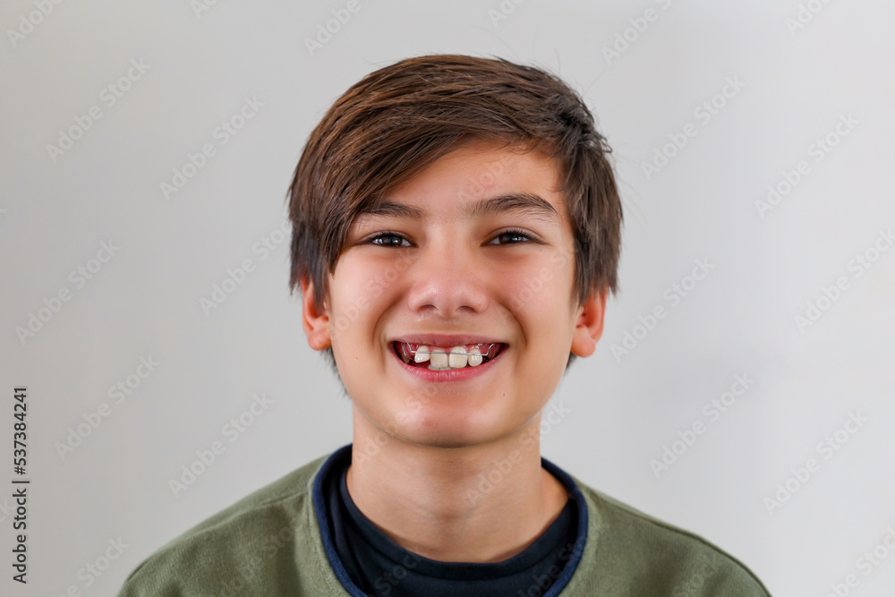 Children tooth care and hygiene. Portrait of a teenager boy with ...