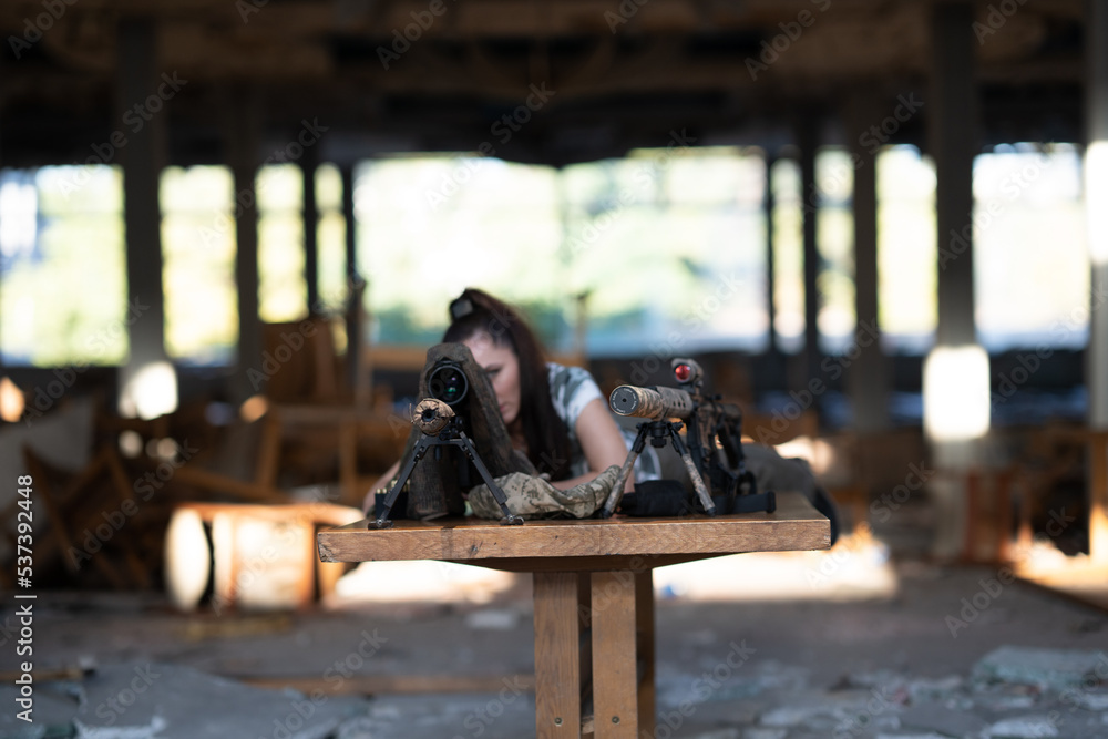 female sniper with a rifle Stock Photo | Adobe Stock