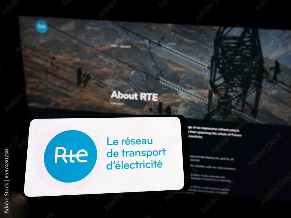 Stuttgart, Germany - 10-01-2022: Person holding mobile phone with logo ...