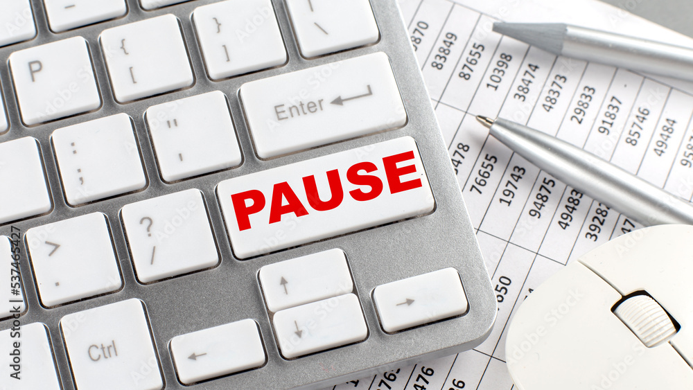 PAUSE text on a keyboard wirh chart and pencil Stock Photo | Adobe Stock