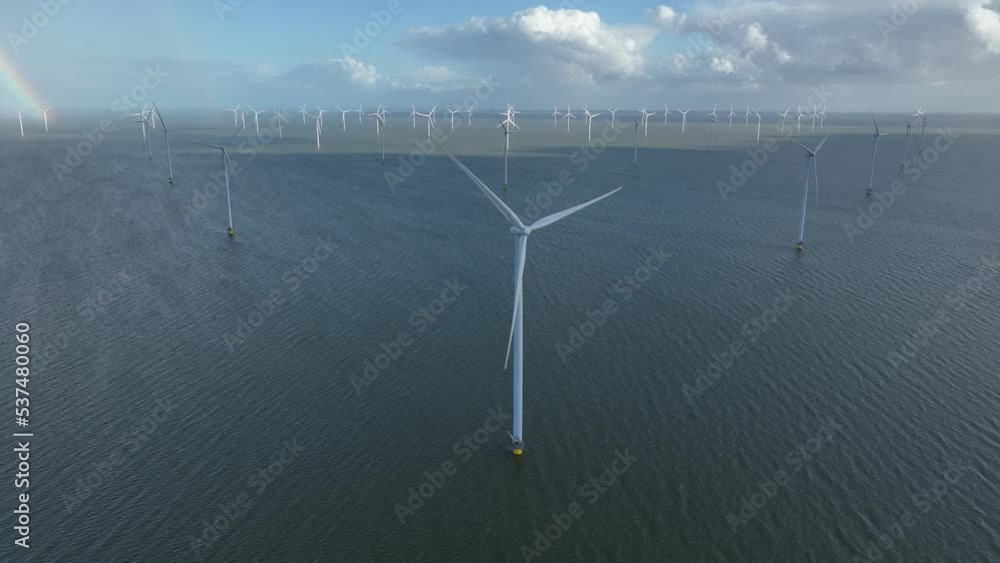 Offshore windmill windfarm turbine energy electricity generation wind ...