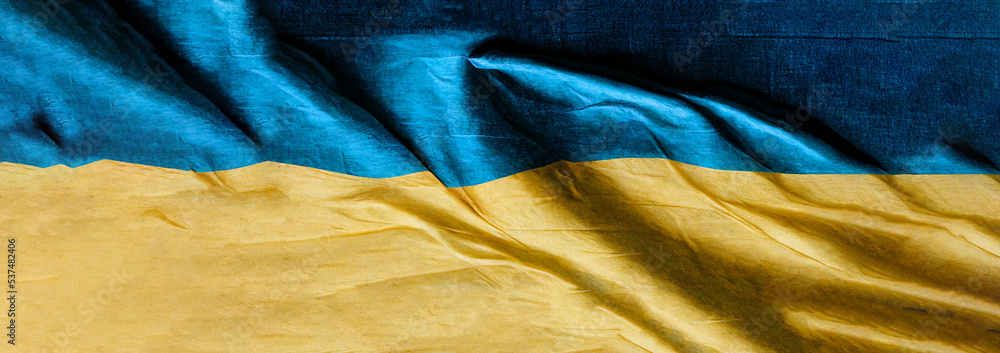 Banner with background of waving flag of Ukraine with sky texture over ...