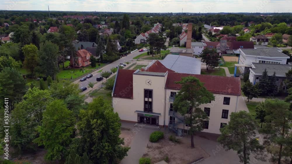 Skyline from the small town Brieselang. Smooth aerial view flight ...