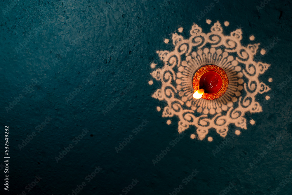 Happy Diwali Festival of Lights teal color background with red and ...
