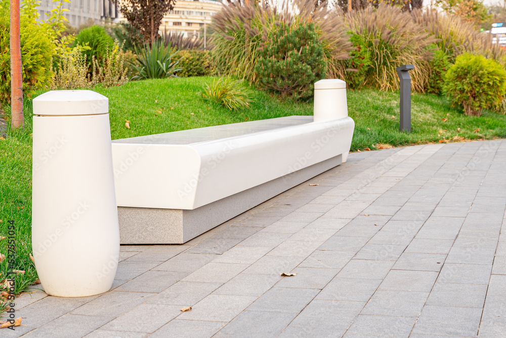 Modern bench in the city park. Improvement of the city, urban planning ...