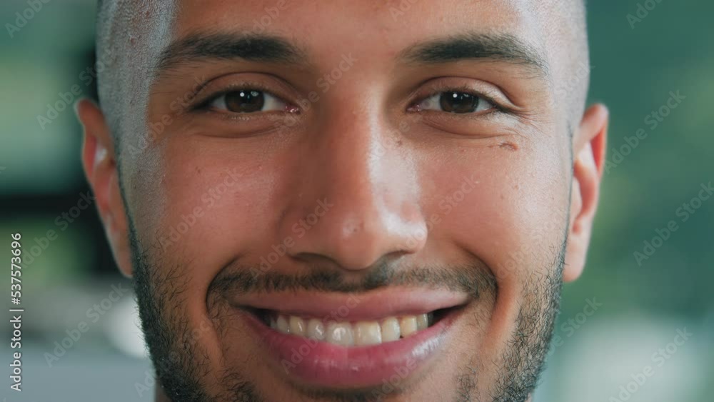 Extreme close up male facial expression man head African American glad ...