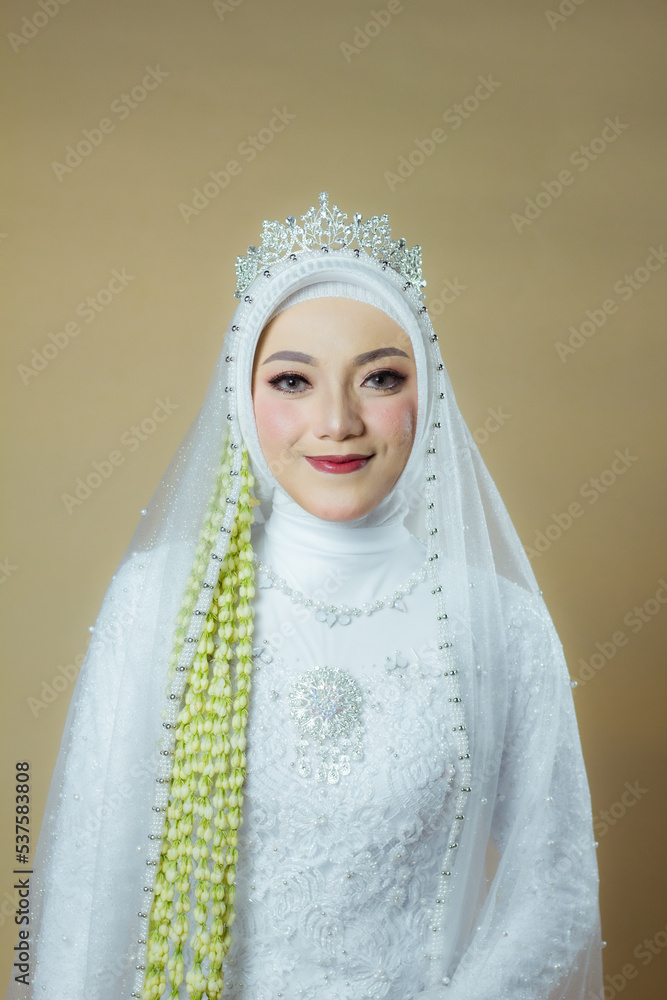 beautiful model, wearing hijab, Javanese Indonesian wedding dress in an ...