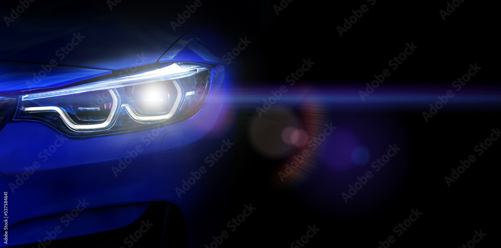 Car headlights with light rays and copy space, banner. Neon light of ...