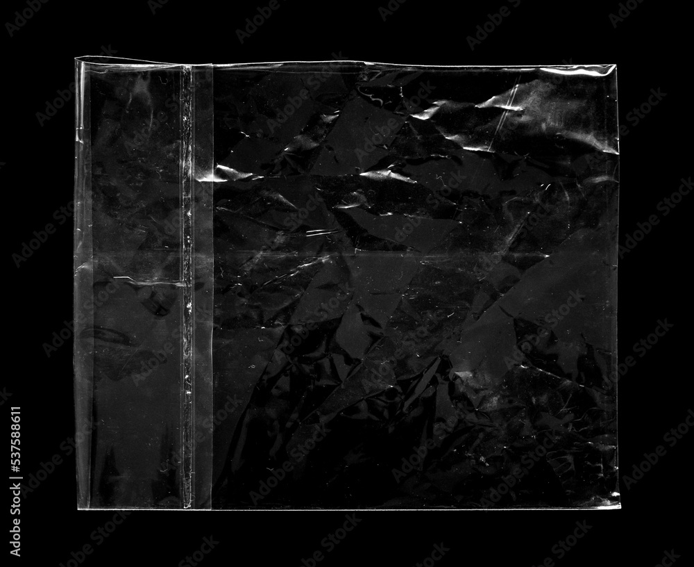 Blank transparent plastic bag overlay on black background Stock Photo ...