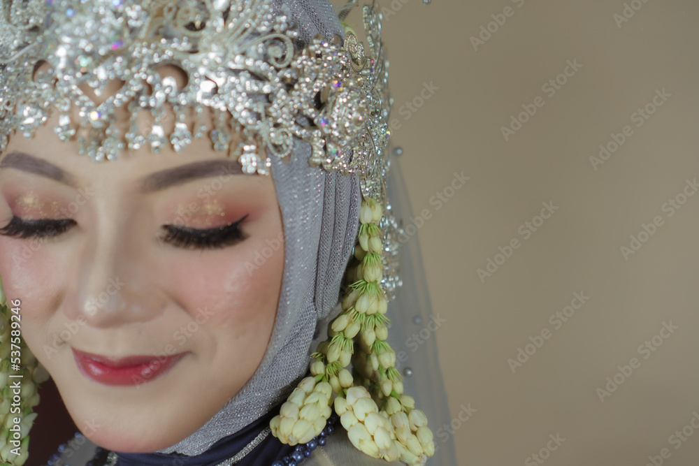 beautiful model, wearing hijab, Javanese Indonesian wedding dress in an ...