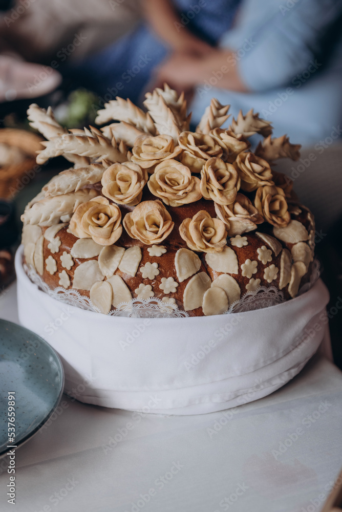 Wedding bread - loaf (cake). Wedding bread. A loaf is decorated with ...