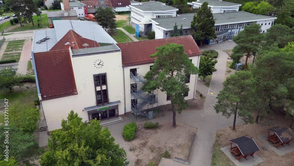Fire escape at school building. Gorgeous aerial view flight raise up ...