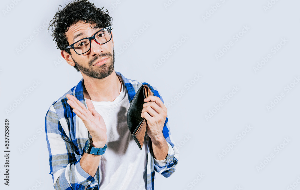 Sad person showing an empty wallet. Man with financial problems shaking ...