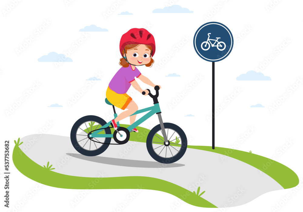 Traffic education. A cute little girl in a helmet rides a bike on a ...
