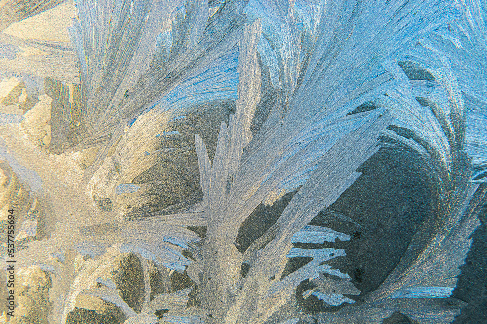 Frozen winter window with shiny ice frost pattern texture. Christmas ...