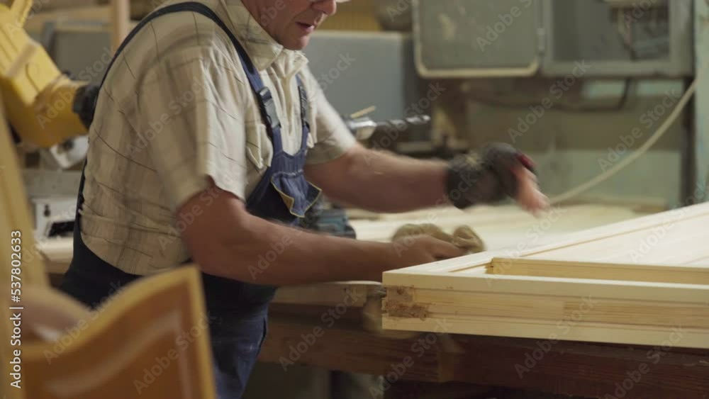 Video Stock Craftsman is using the hammer tool to combine multiple ...