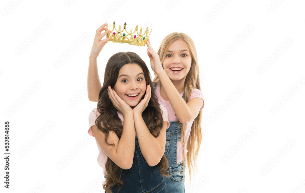 Success attends hard work. Small girl rewarding little beauty queen ...