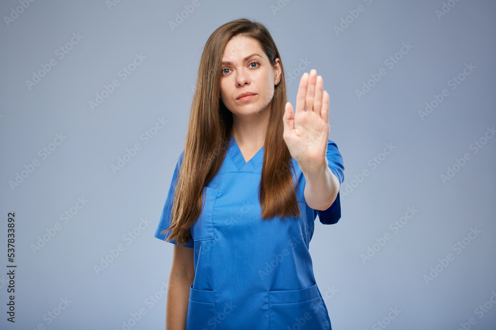 Entering without protective medical equipment is forbidden. Woman stop ...