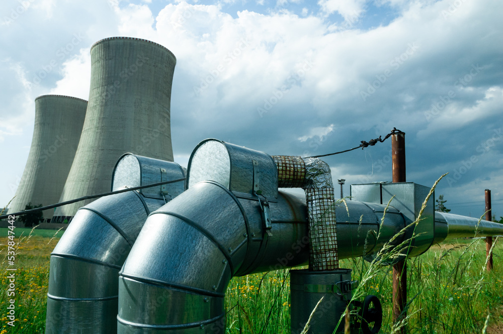Nuclear power plant chimneys with steam pipes in front Stock Photo ...
