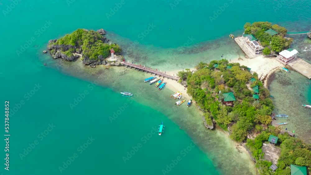 Tropical island with a sandy beach top view. Quezon Island Beach ...