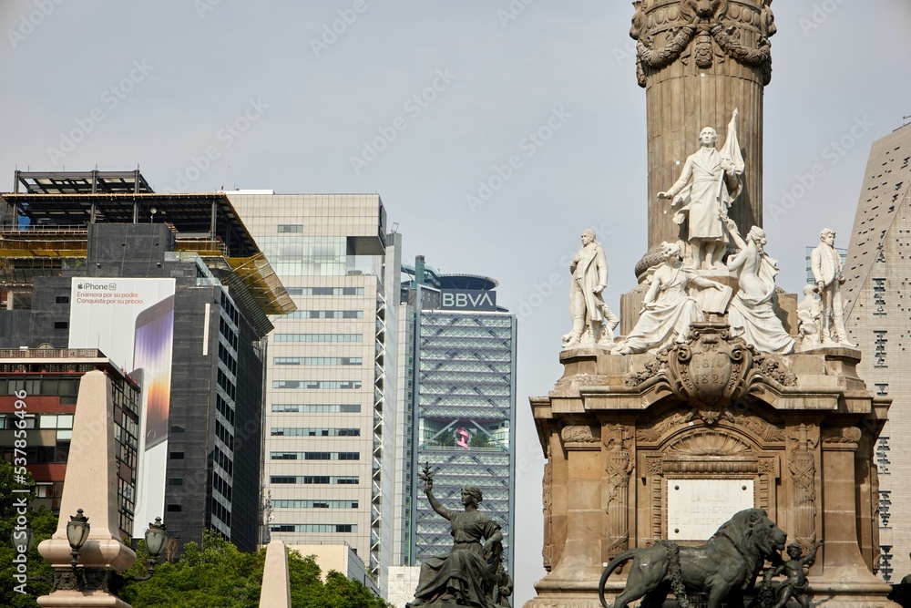 Base of the Angel of Independence statue from the right, some other ...