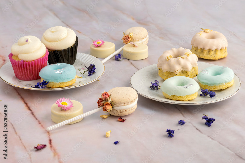 table of sweet products of fine pastry with macarons alfajores ...