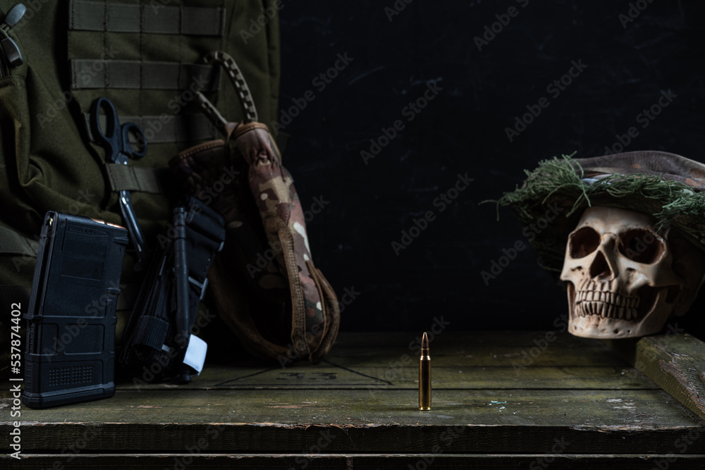 Cartridge for machine gun and skull. Paramedic and ammo. Military theme ...