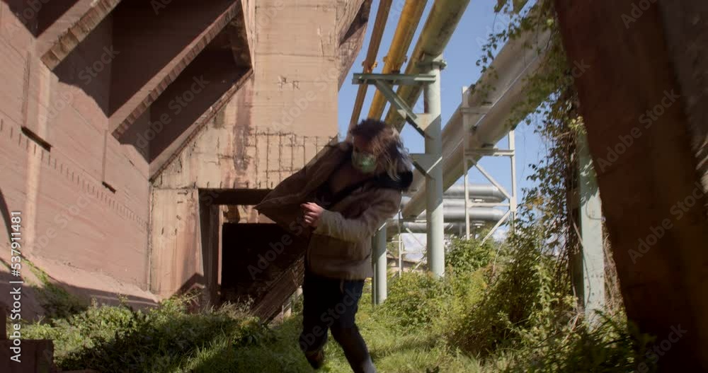 Frightening and scaring portrait of zombie man wearing medical mask ...