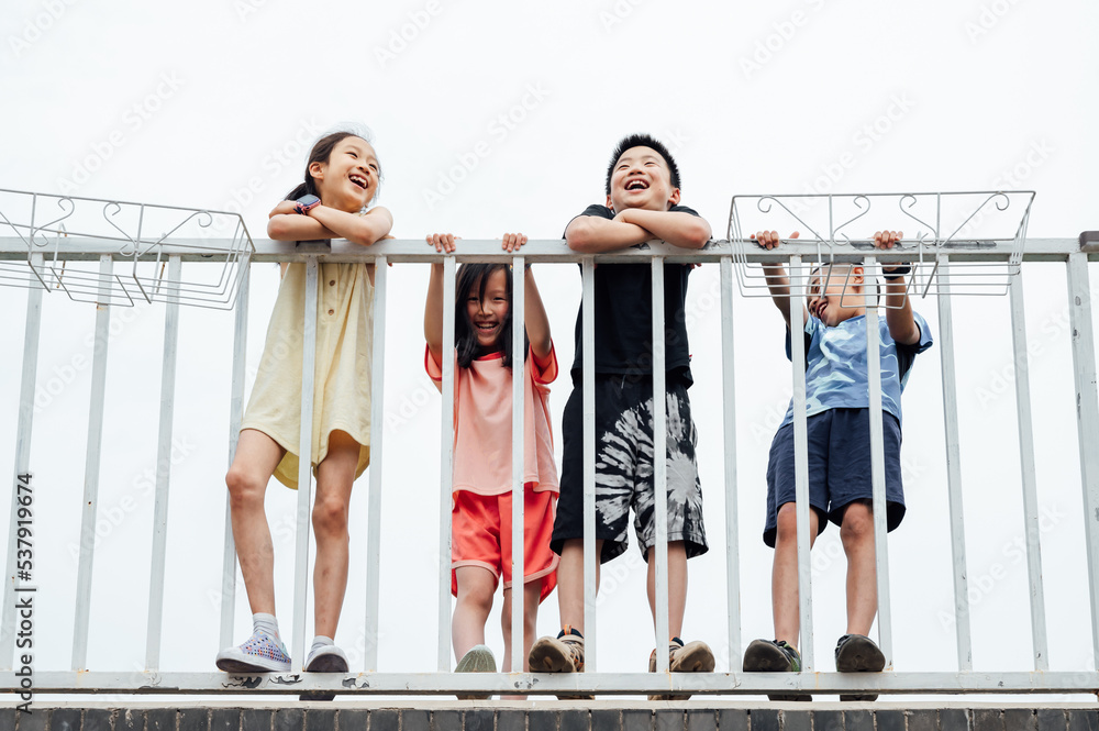 Portrait of little kids playing together Stock Photo | Adobe Stock