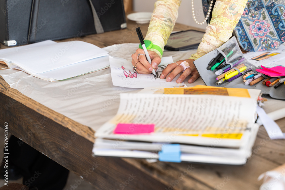 Anonymous Designer Working With Sketches Stock Photo | Adobe Stock