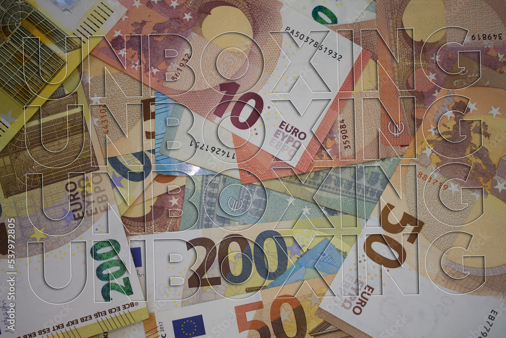 Unboxing word with money. Paper currency background with different ...