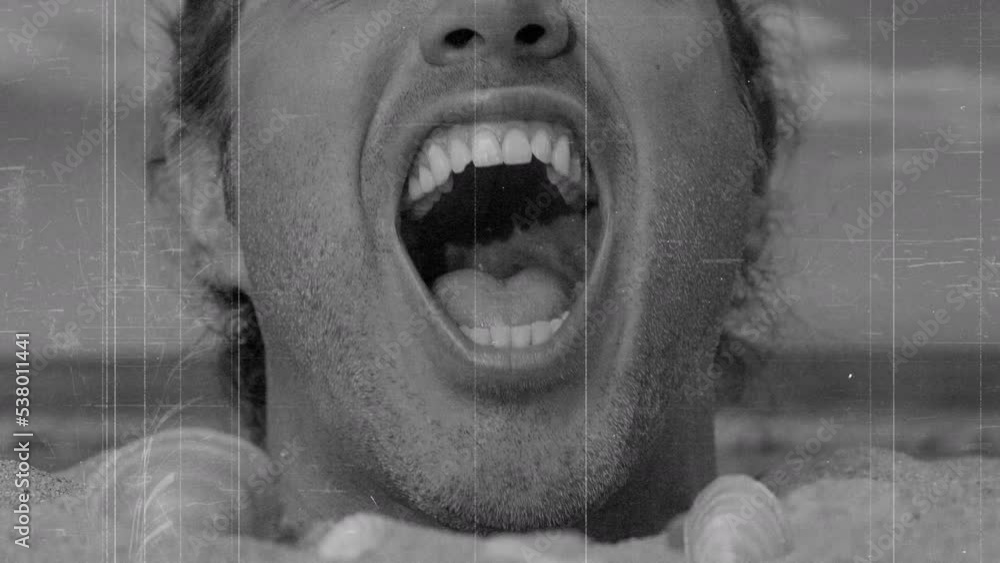 A man buried in sand on beach screaming Stock Video | Adobe Stock