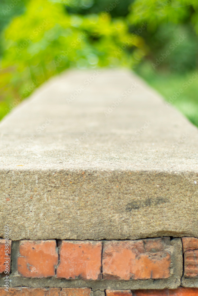 Backdrop with old stone parapet in soft focus. Template for adding an ...