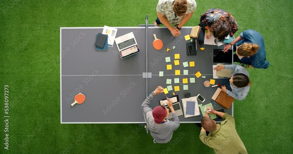 Brainstorming, team planning and technology, sticky notes and tablet ...