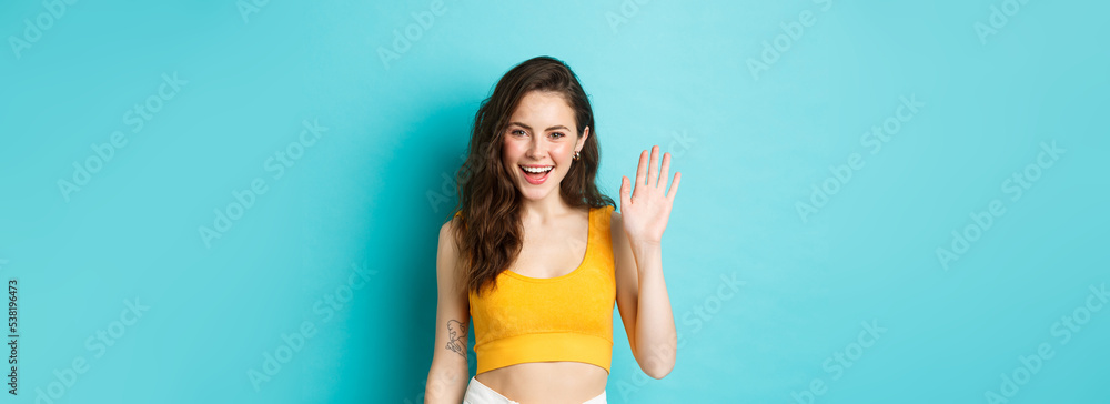 Summer holidays and emotions concept. Cheerful friendly woman with ...