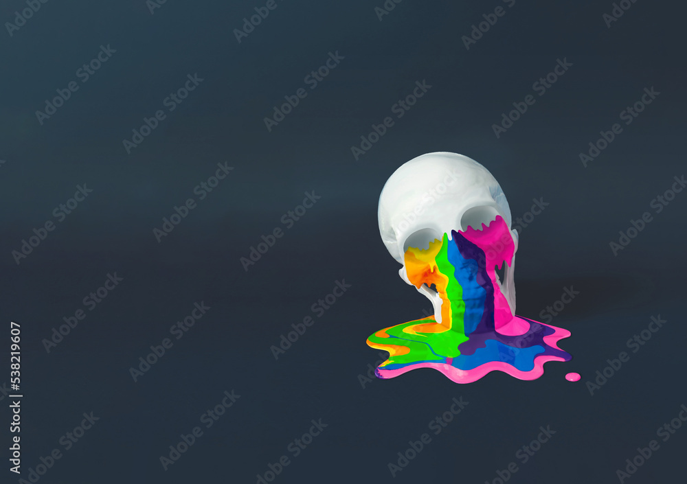 Skull with vivid paint which is dripping, leaking and pouring on dark ...