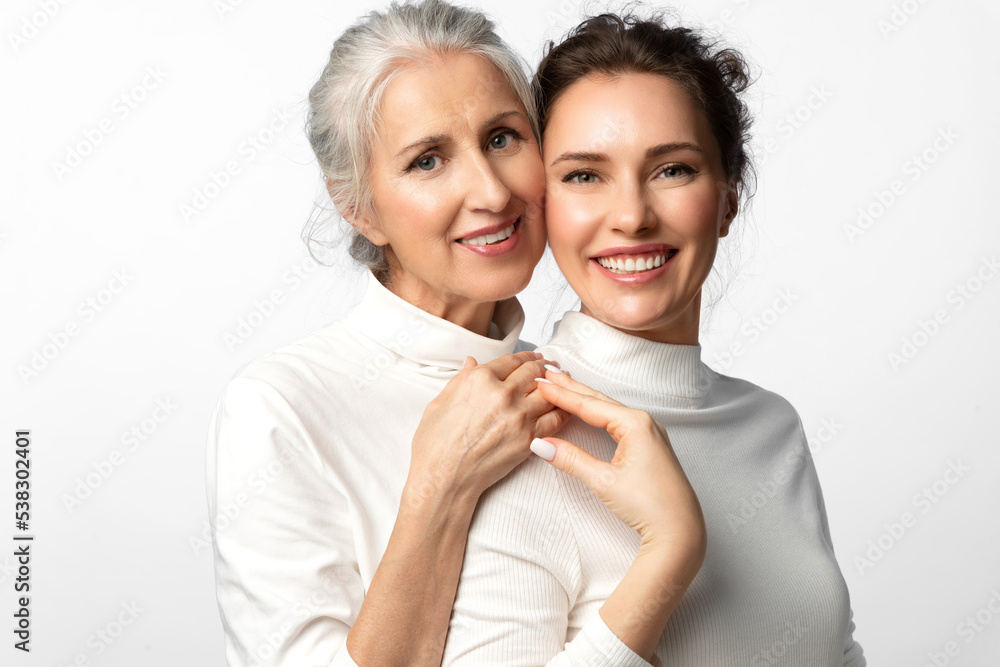 Cosmetic portrait of two women of different ages and generations ...