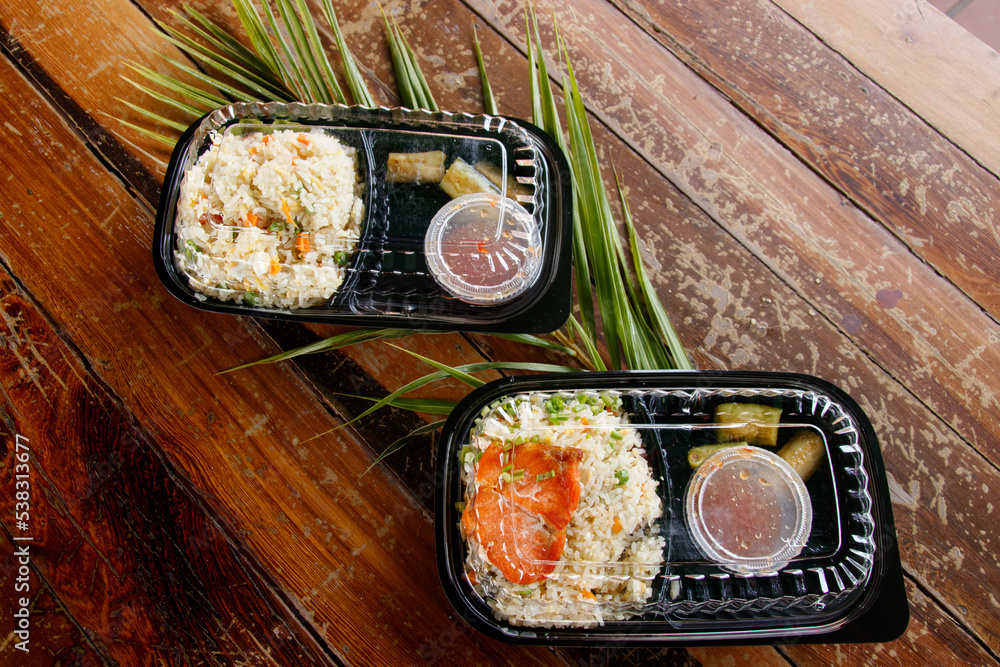 Top view of traditional khmer food packed in single use plastic for ...