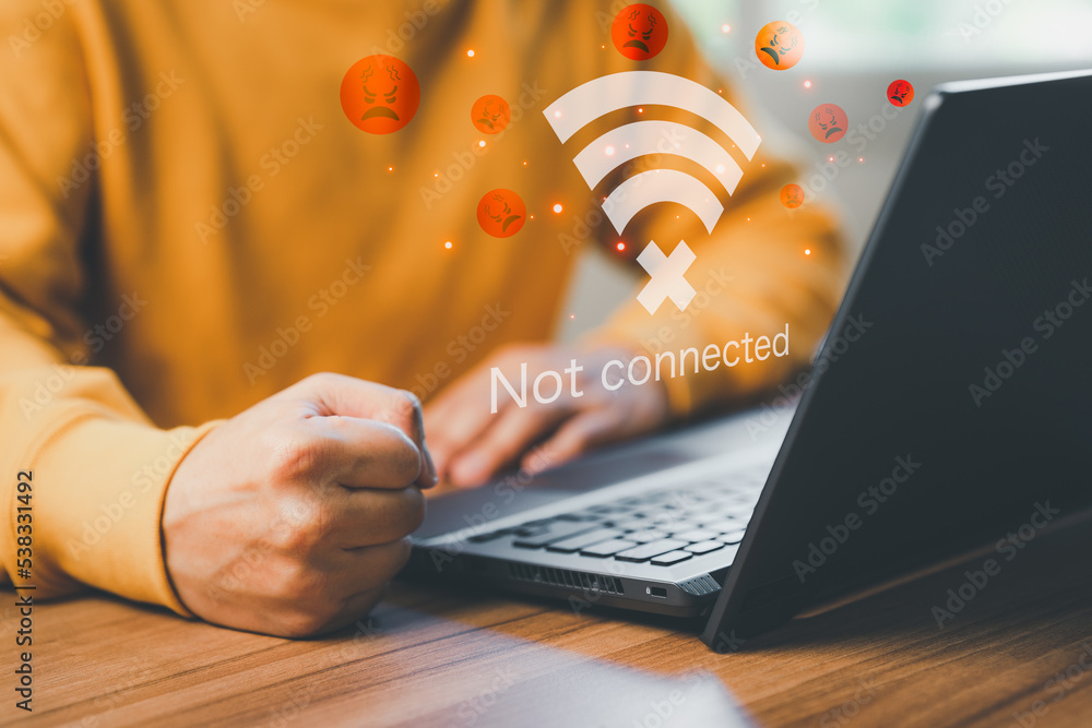 Man using a computer laptop to connect to wifi but wifi not connected ...