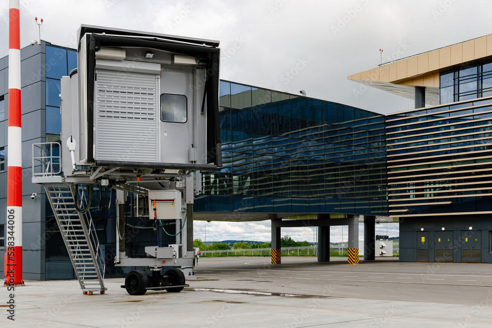 Aircraft passenger boarding bridge. Jetway Stock Photo | Adobe Stock