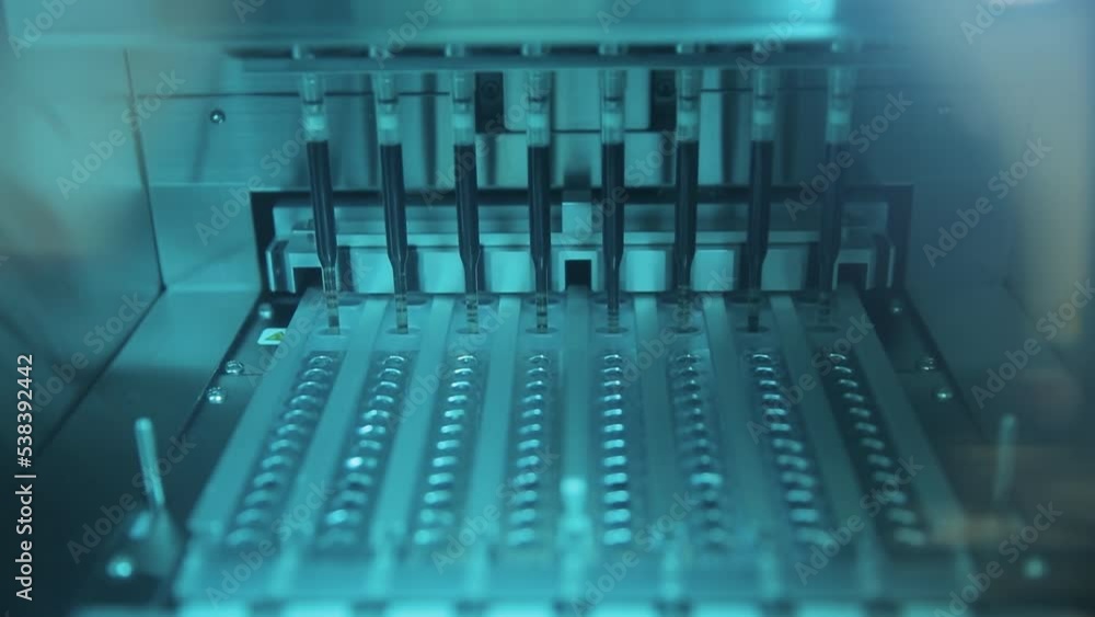 Close-up view of medical laboratory equipment. Glass tubes filled with ...