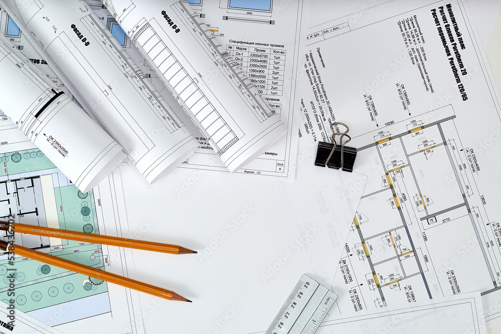 Working tools and drawings of the designer on a white background ...