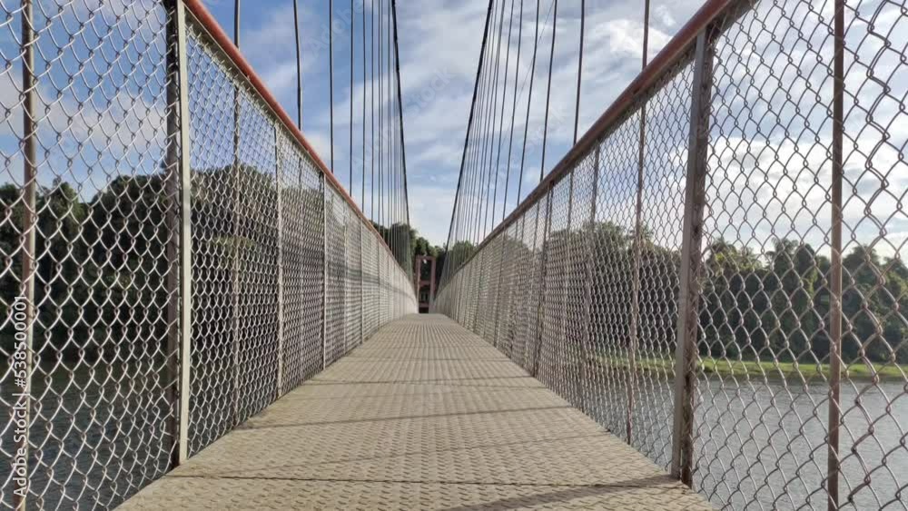Hanging suspension bridge architecture made with join iorn metal cable ...